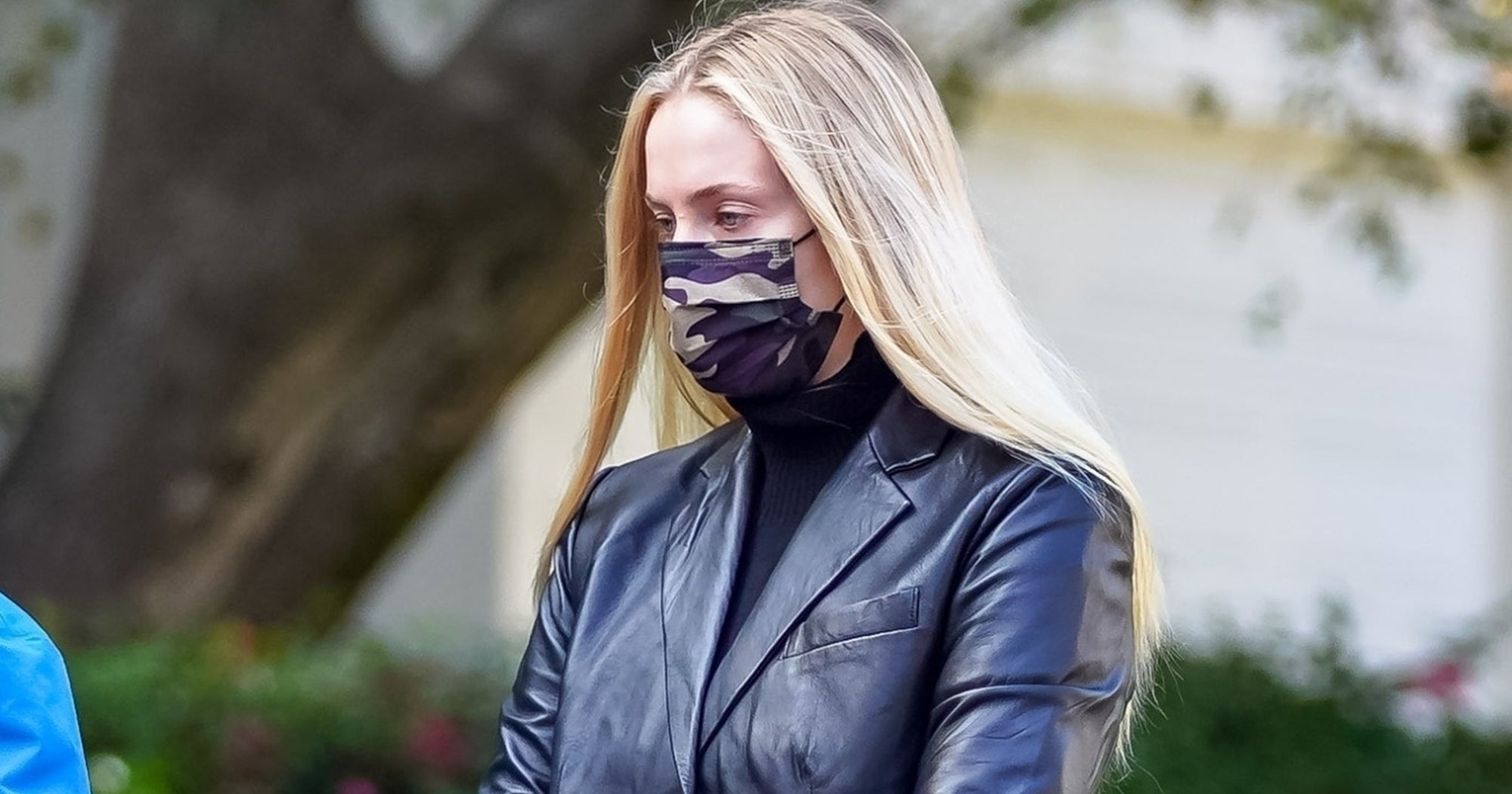 Sophie Turner Wore A Leather Blazer & LV Boots