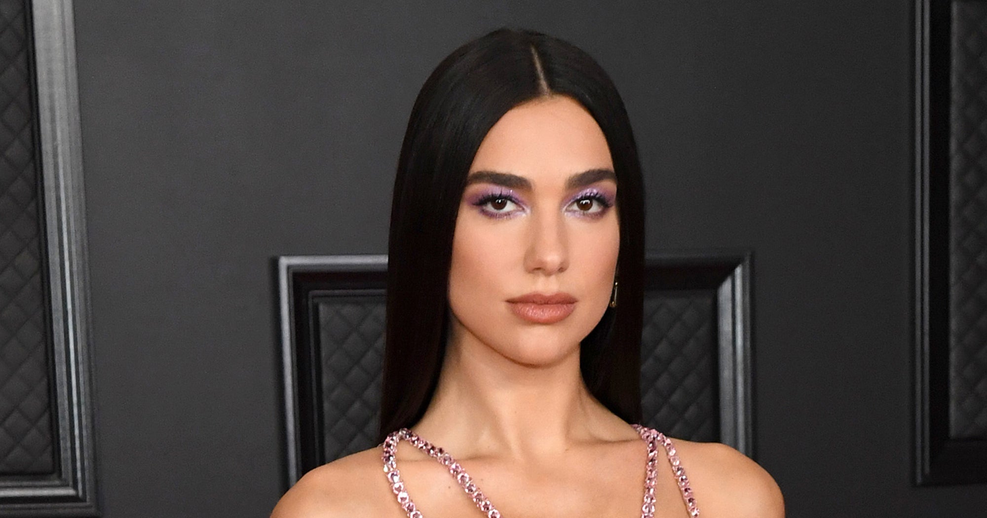 Dua Lipa Paired A Neon Suit With A Floss String Bikini