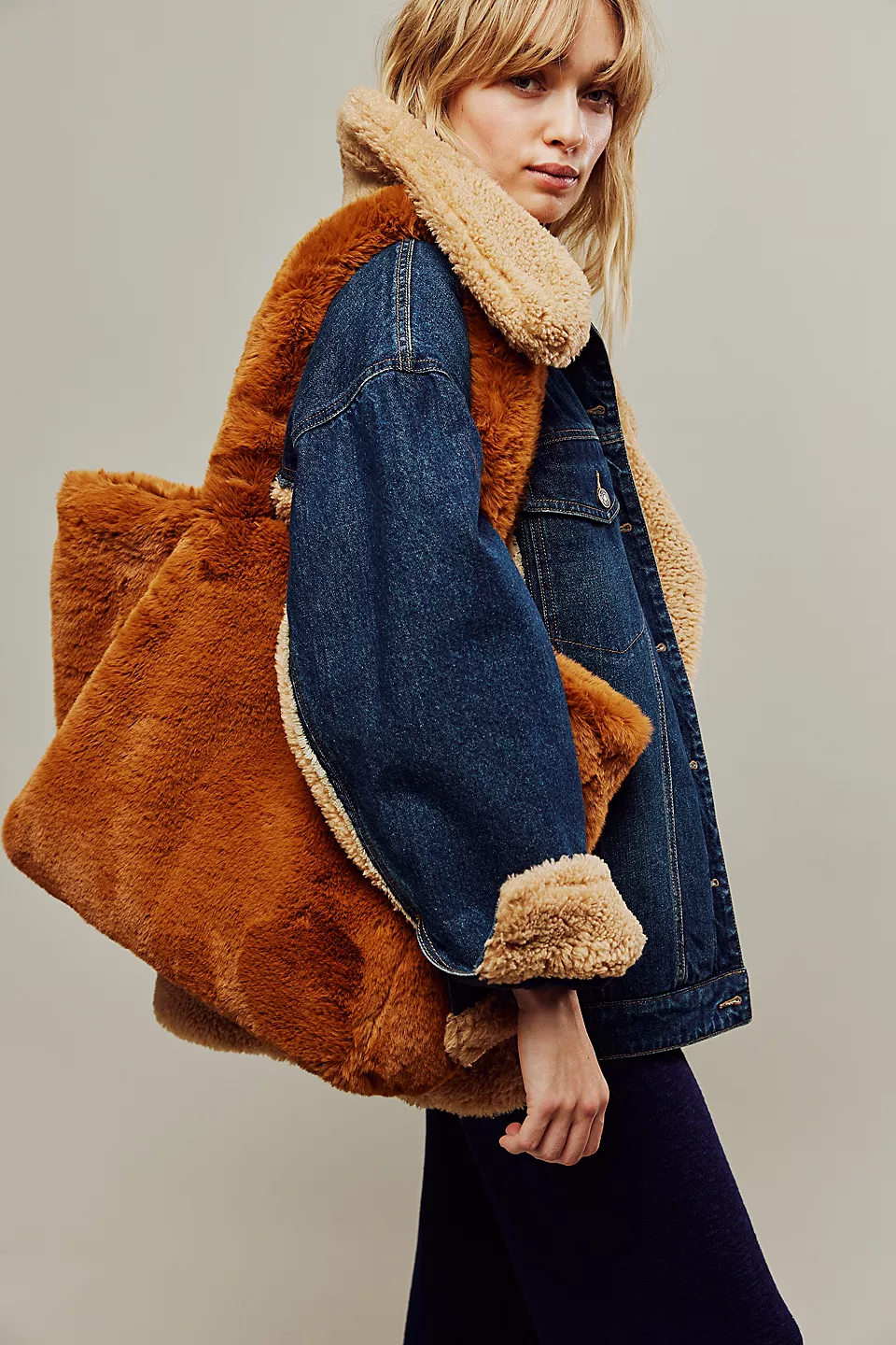 The fuzzy purse trend is here to stay — and here’s how to wear it ...