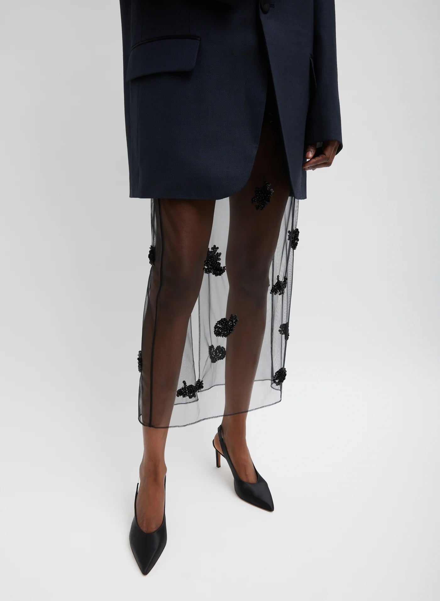 9 Fashion Trends Defining 2025: Capes To Bubble Skirts