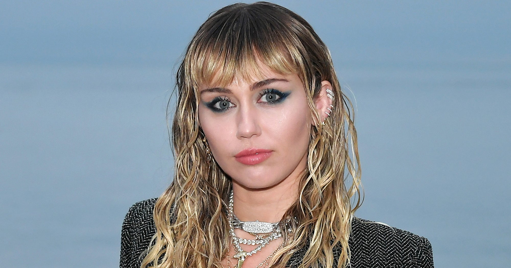 Miley Cyrus Reveals Freedom & Yoko Ono Tattoos