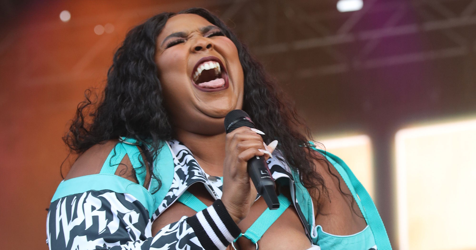 Is This Why Lizzo Always Wears Harnesses & Corsets?