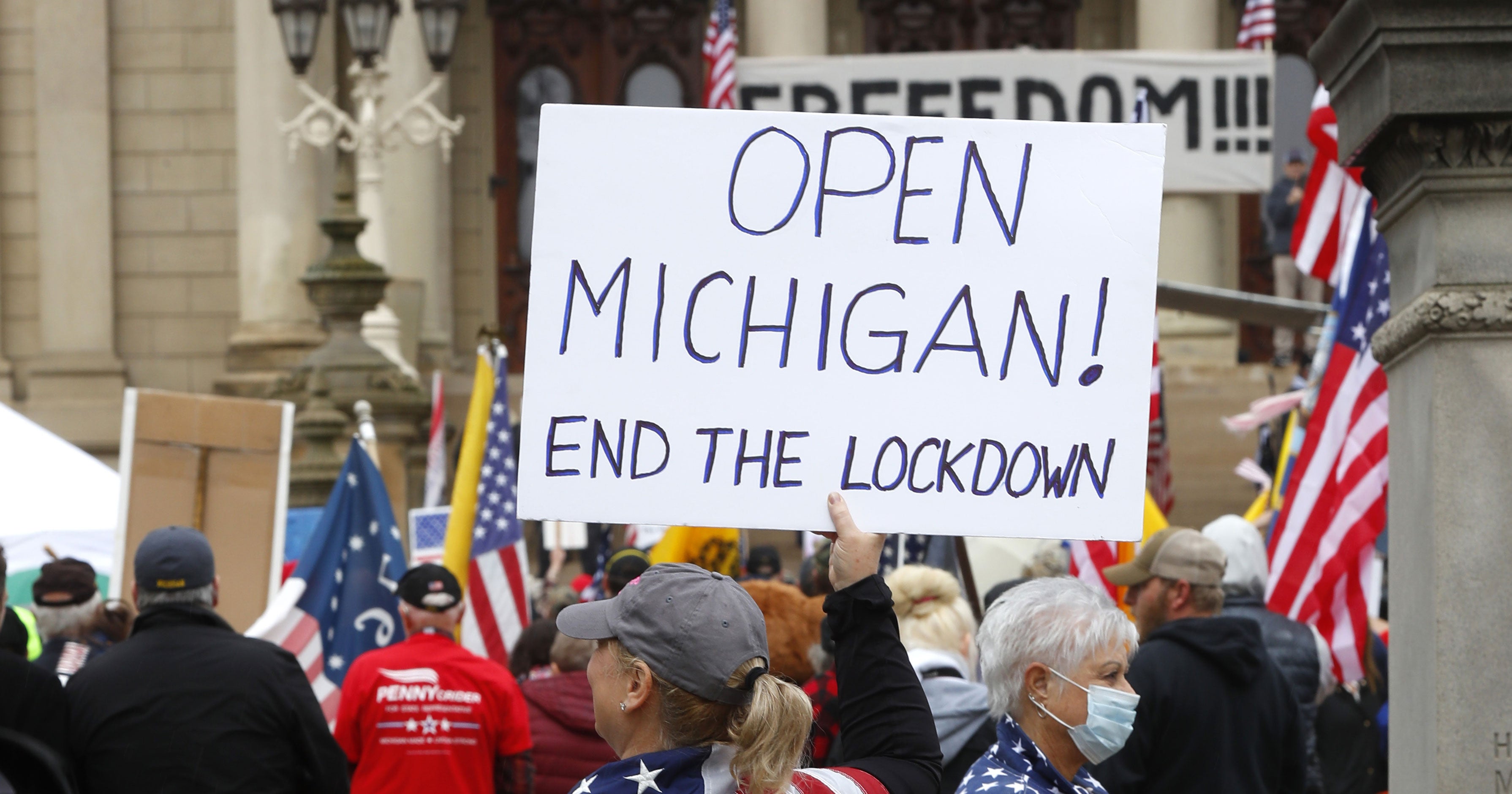 Armed Militia Guard Michigan Barbershop From Police
